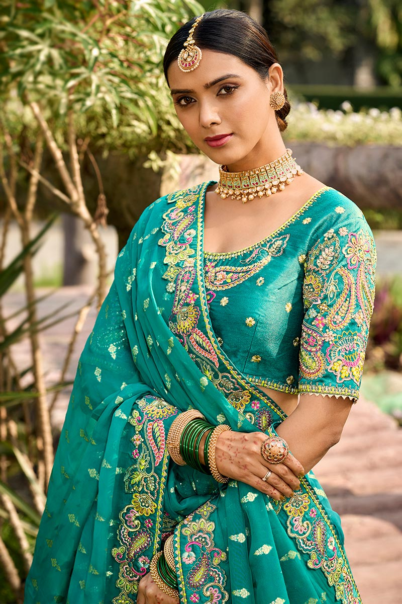 Persian Green Silk Resham Embroidered Panelled Style Lehenga LLCV118310