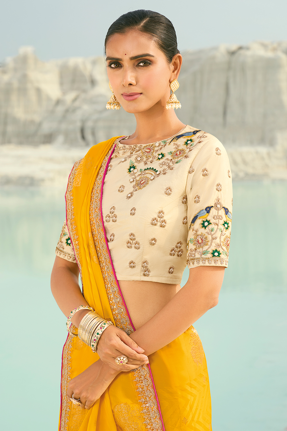 Yellow Georgette Broad Border Saree With Weaved Work For Haldi - SARV198484